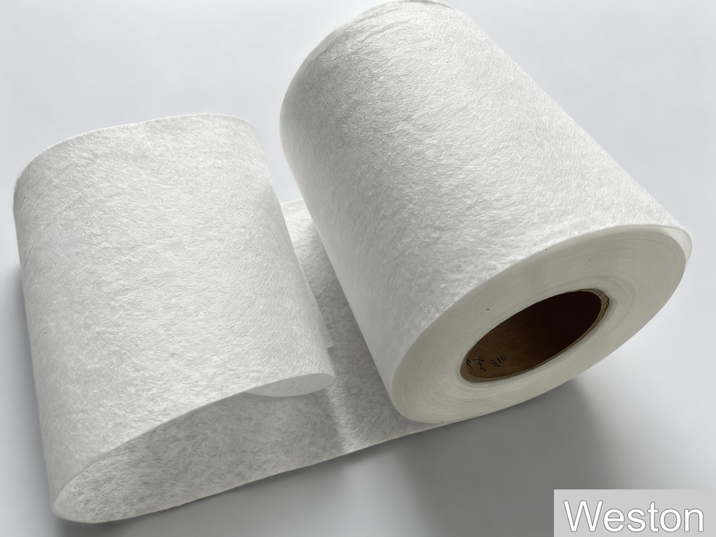 Rolled soft thermal bonded nonwoven fabric showcasing smooth texture ...