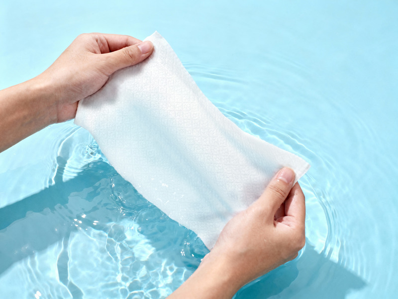 half of weston Embossed Facial Cleansing Wipe in water